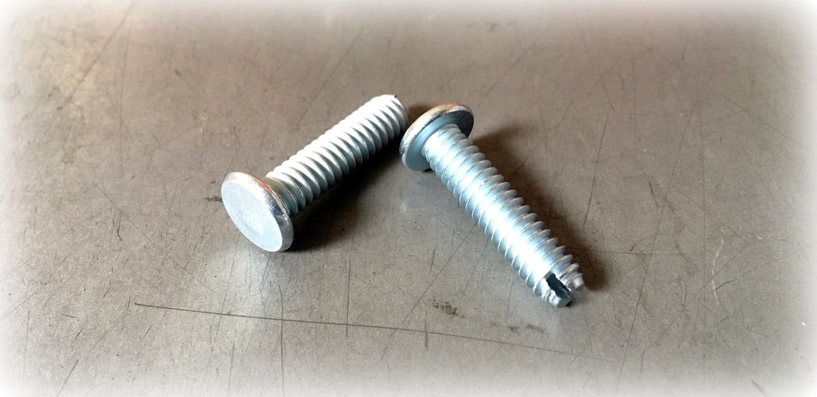 Custom Slotted Reverse Drive Machine Screws - Engineered Custom Bolts ...